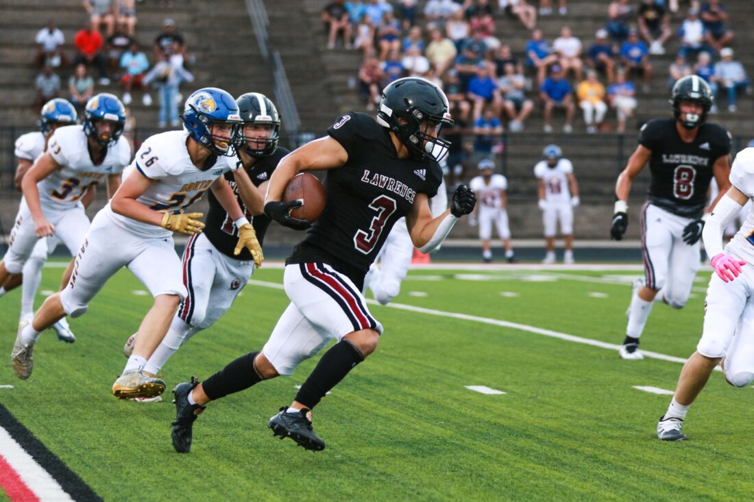 LHS football drops wild season opener, 36-32 to visiting Olathe South ...